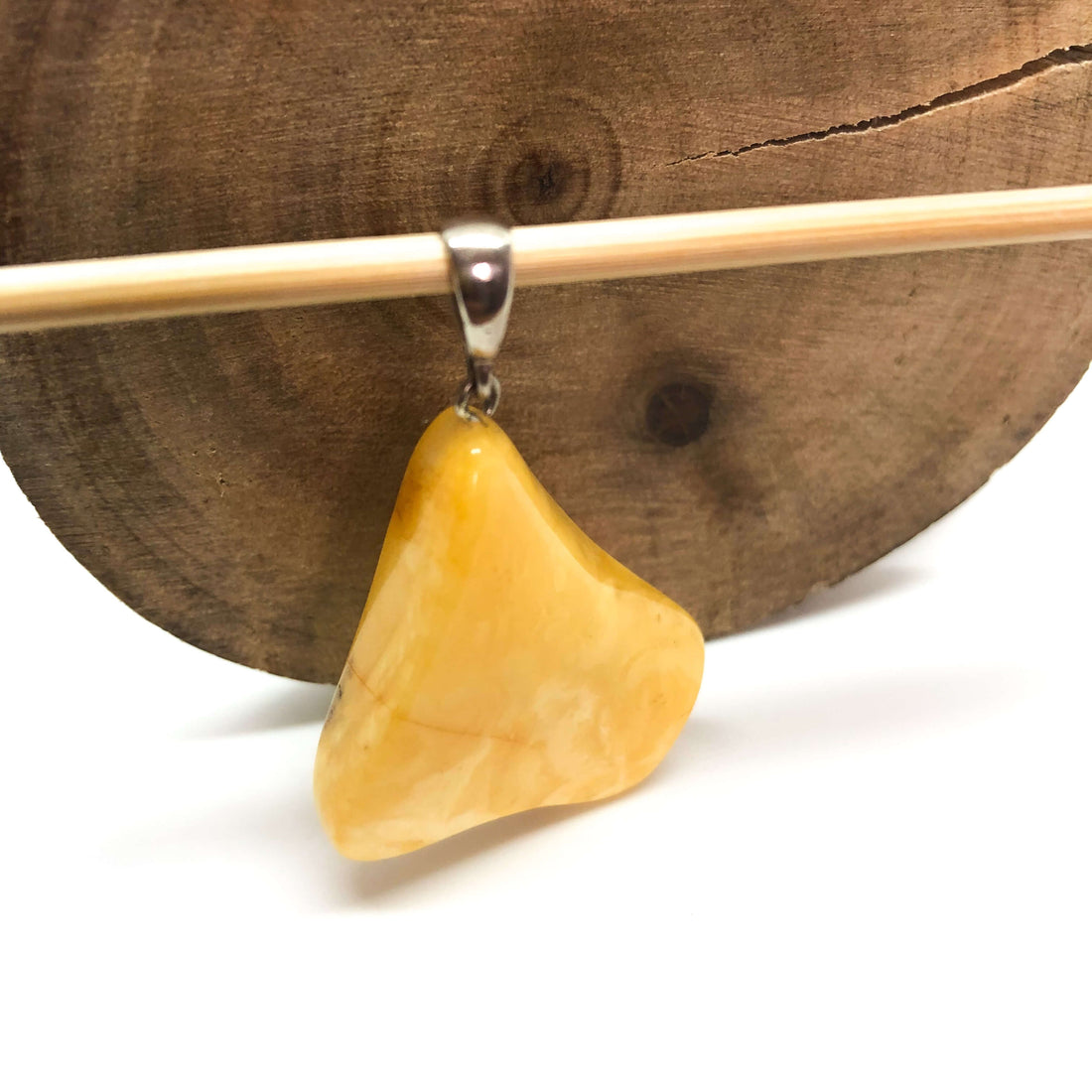 Natural Handmade Amber Pendant In Yellow Coloured | Amber Secrets